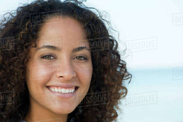 Woman smiling, portrait - Royalty-free Stock Photo | Dissolve