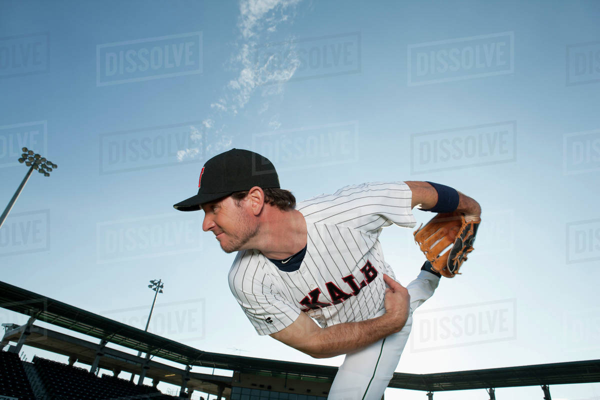 Baseball player pitching - Royalty-free Stock Photo | Dissolve