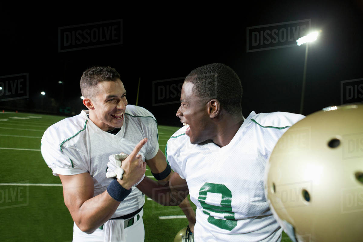 Football players celebrating victory together - Royalty-free Stock ...