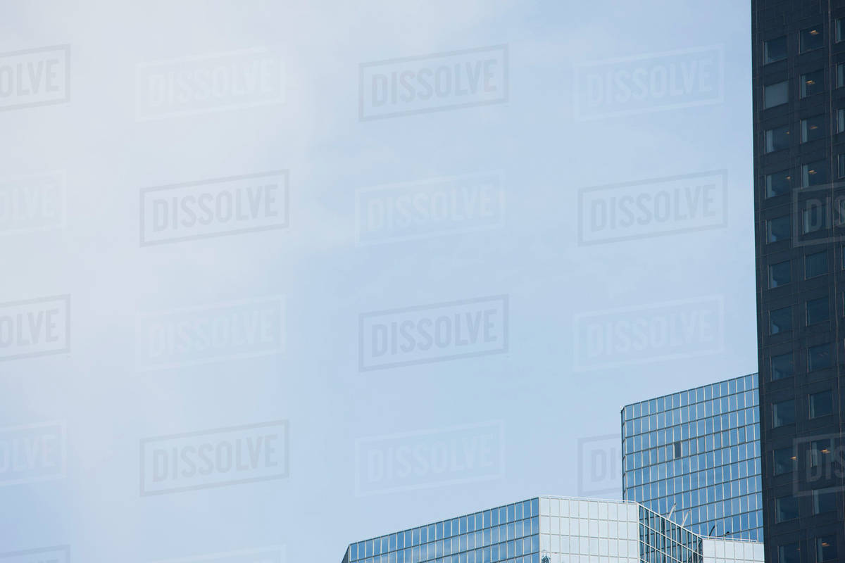 Modern buildings and blue sky - Royalty-free Stock Photo | Dissolve