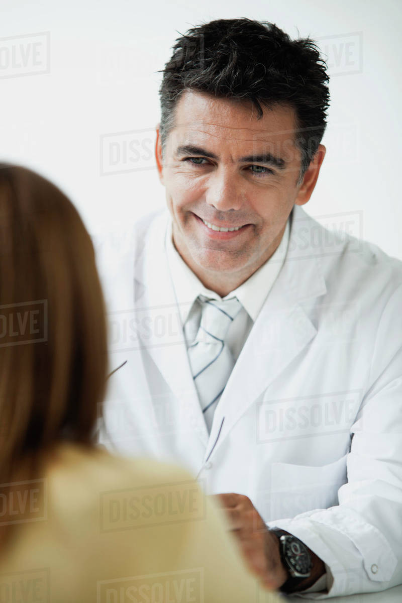 Doctor meeting with patient for consultation - Royalty-free Stock Photo ...