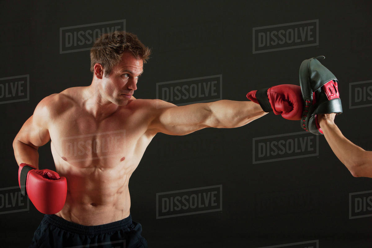 Barechested boxer sparring - Royalty-free Stock Photo | Dissolve