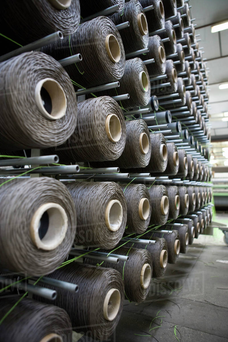 Fabric coating plant, weaving department, unwinding creel - Royalty ...