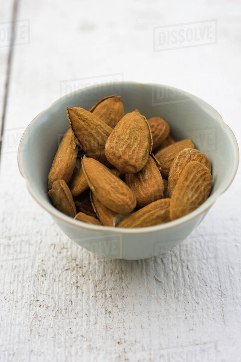 Almonds in bowl - Royalty-free Stock Photo | Dissolve