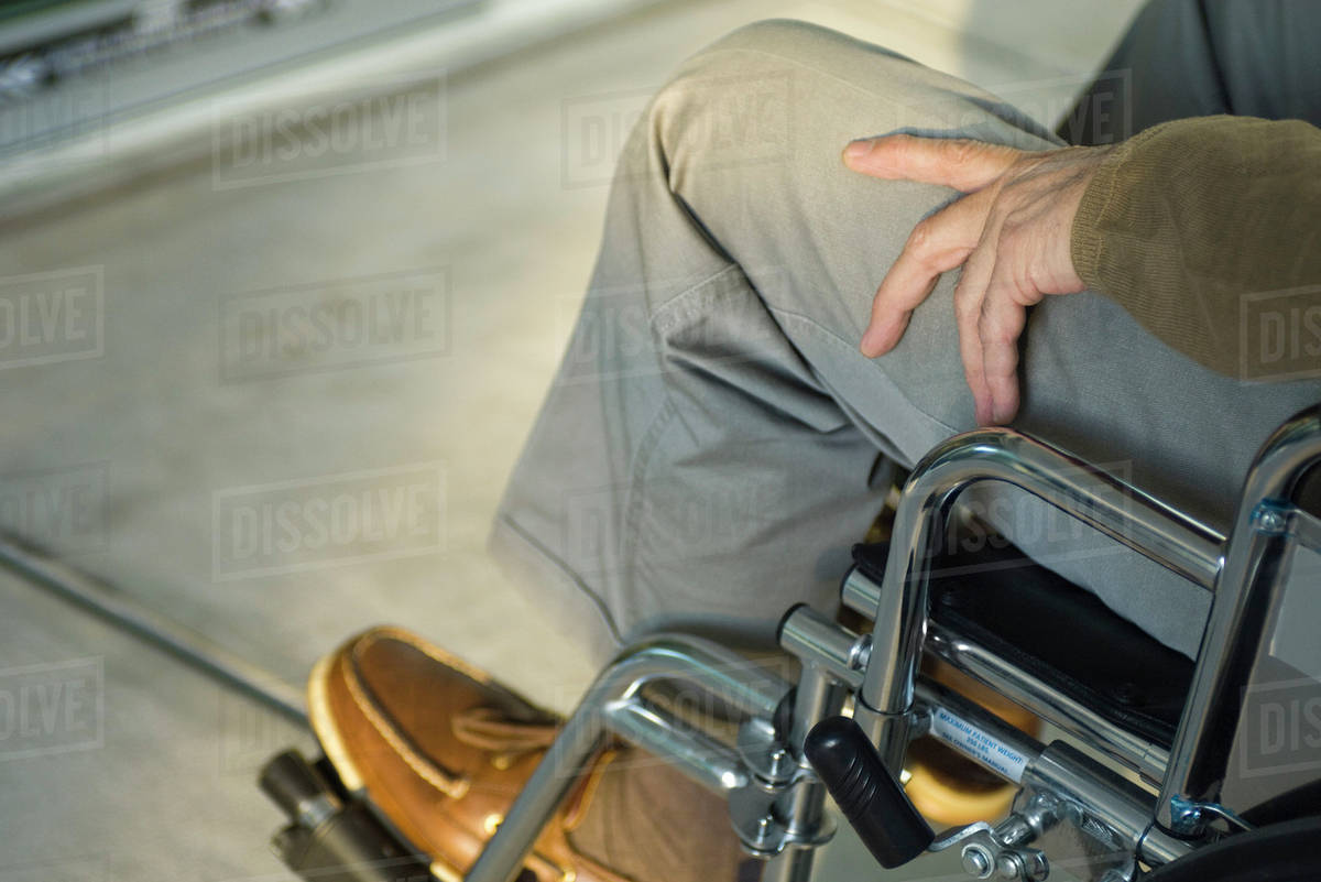 Handicapped person in wheelchair sitting outdoors - Royalty-free Stock ...