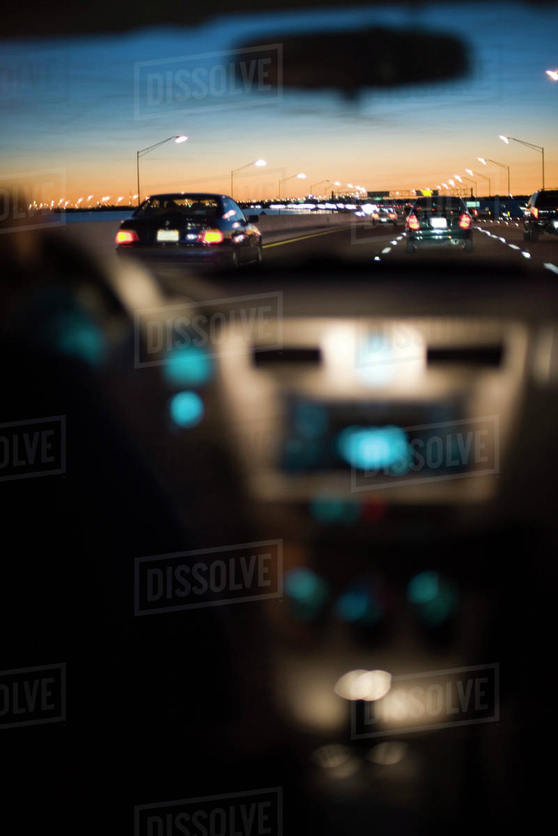 Driving at sunset - Stock Photo - Dissolve