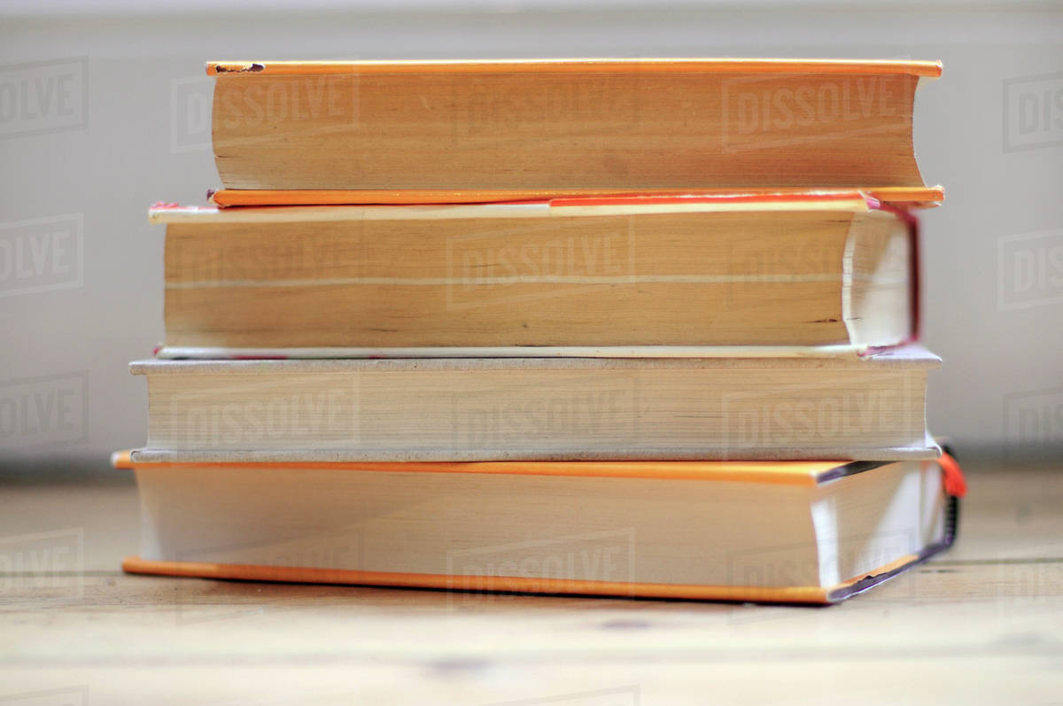 Stacked books, close-up - Royalty-free Stock Photo | Dissolve