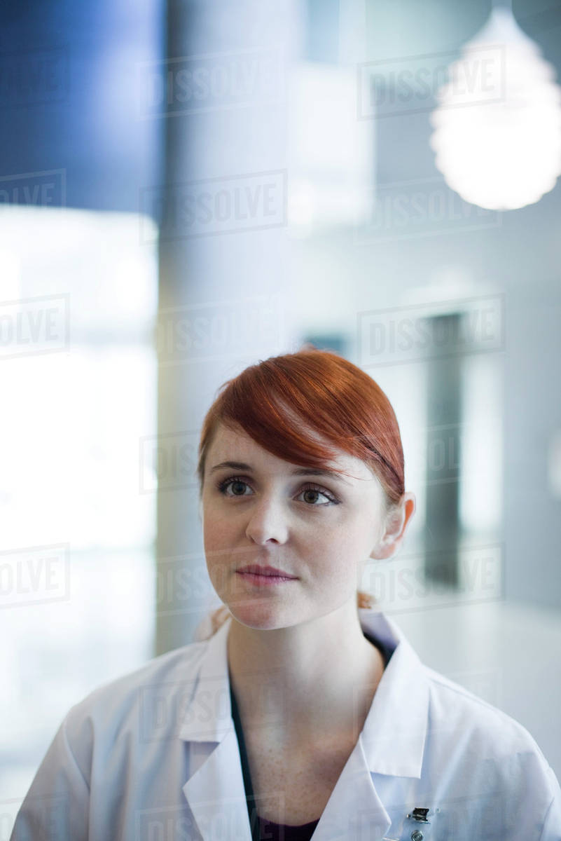 Female healthcare worker, portrait - Royalty-free Stock Photo | Dissolve