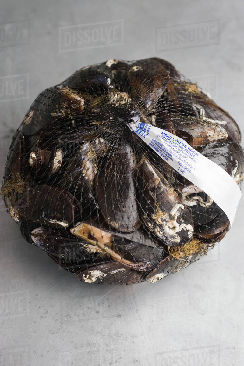 Sack of fresh mussels - Royalty-free Stock Photo | Dissolve