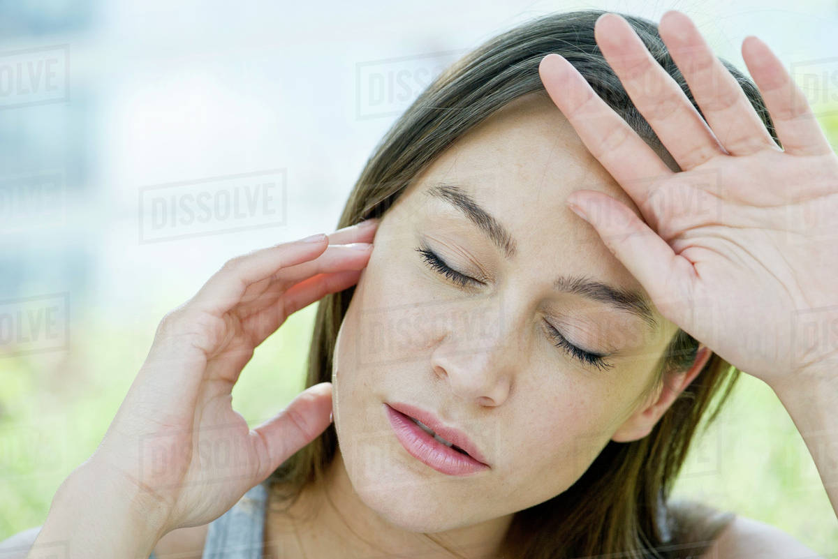 Woman in discomfort - Stock Photo - Dissolve