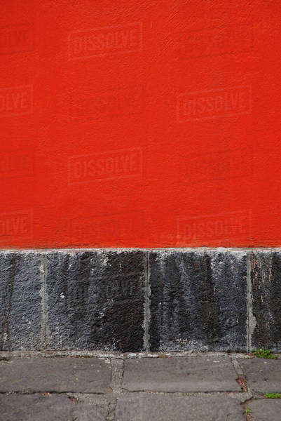 Red stucco wall, close-up - Royalty-free Stock Photo | Dissolve