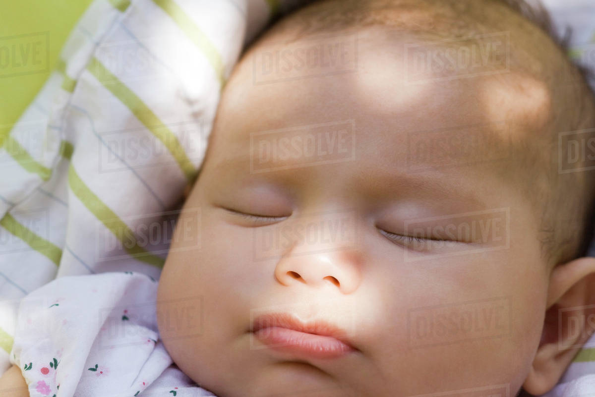 Baby sleeping, portrait - Royalty-free Stock Photo | Dissolve