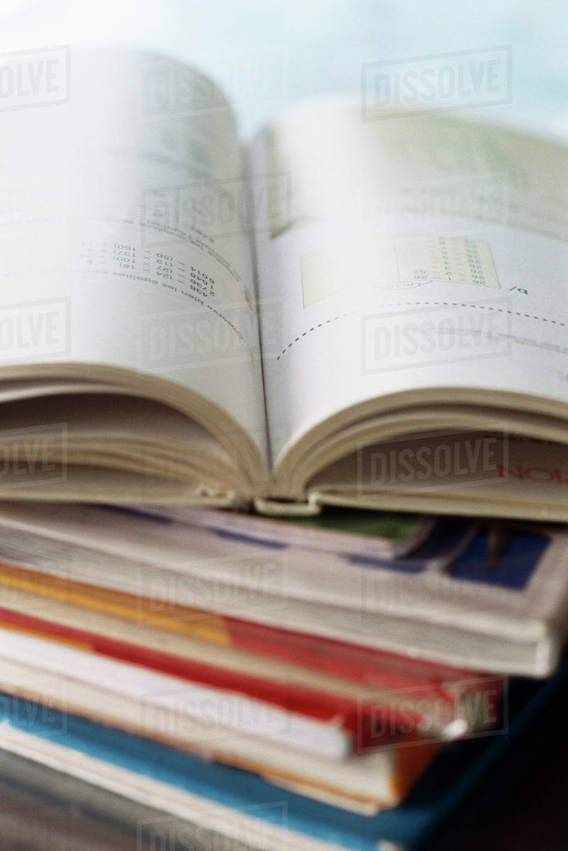 Pile of textbooks - Royalty-free Stock Photo | Dissolve