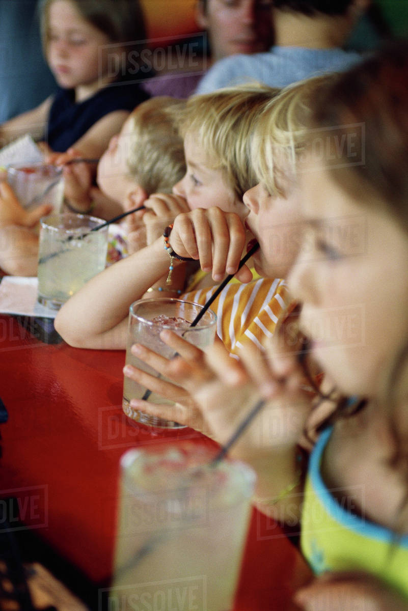Children at snack-time - Stock Photo - Dissolve