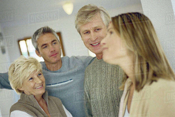 Couple visiting with in-laws - Royalty-free Stock Photo | Dissolve