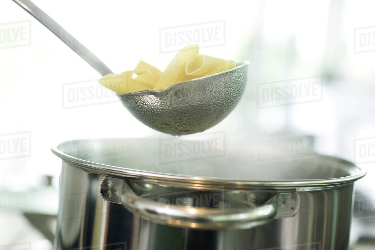 Cooking pasta - Stock Photo - Dissolve