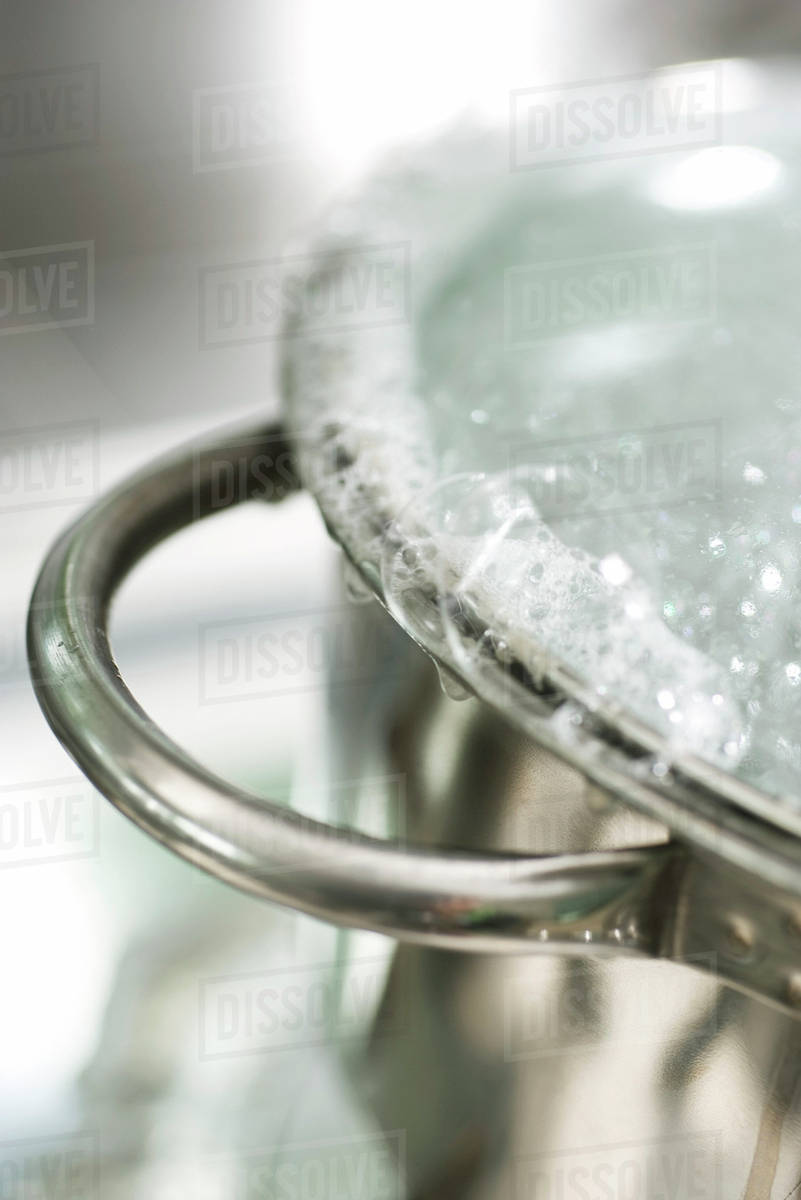 Pot boiling over - Royalty-free Stock Photo | Dissolve