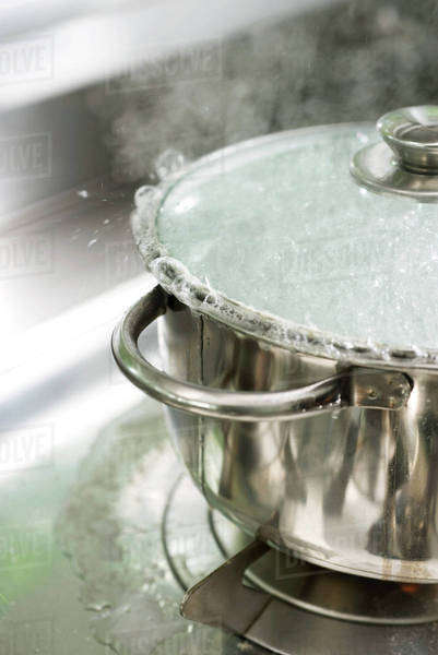 Pot boiling over - Royalty-free Stock Photo | Dissolve