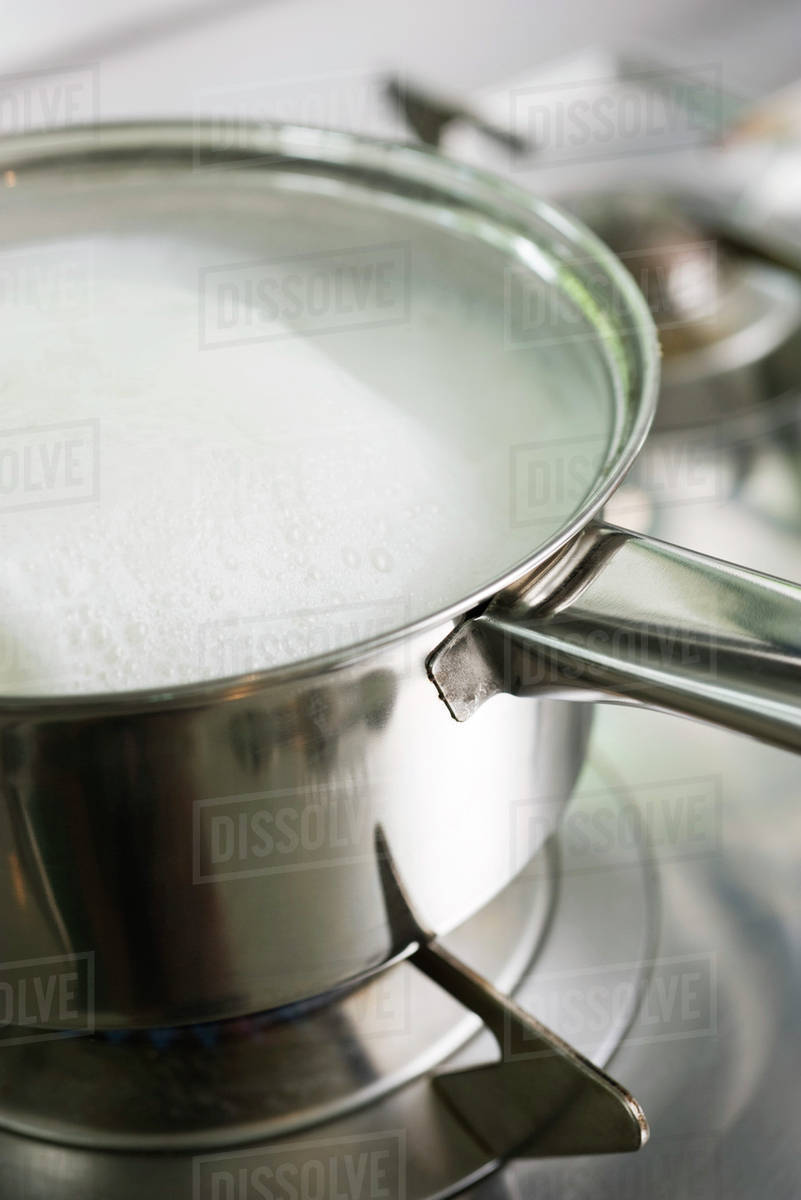 Pot cooking on stove - Royalty-free Stock Photo | Dissolve