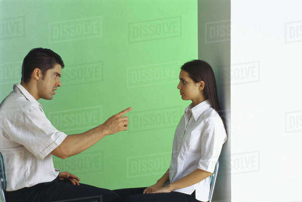 Man reprimanding teenage girl - Stock Photo - Dissolve