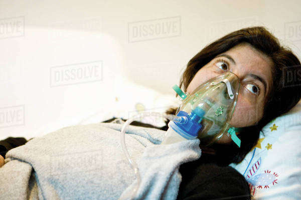 Woman receiving oxygen treatment - Royalty-free Stock Photo | Dissolve