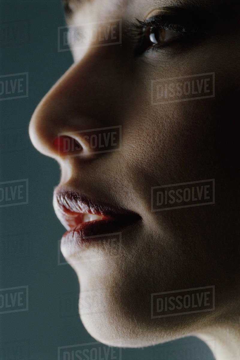 Woman's face, profile, close-up - Stock Photo - Dissolve