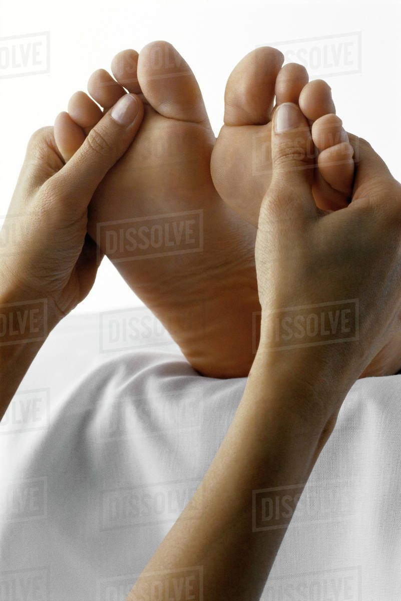 Person receiving foot massage, close-up - Royalty-free Stock Photo ...