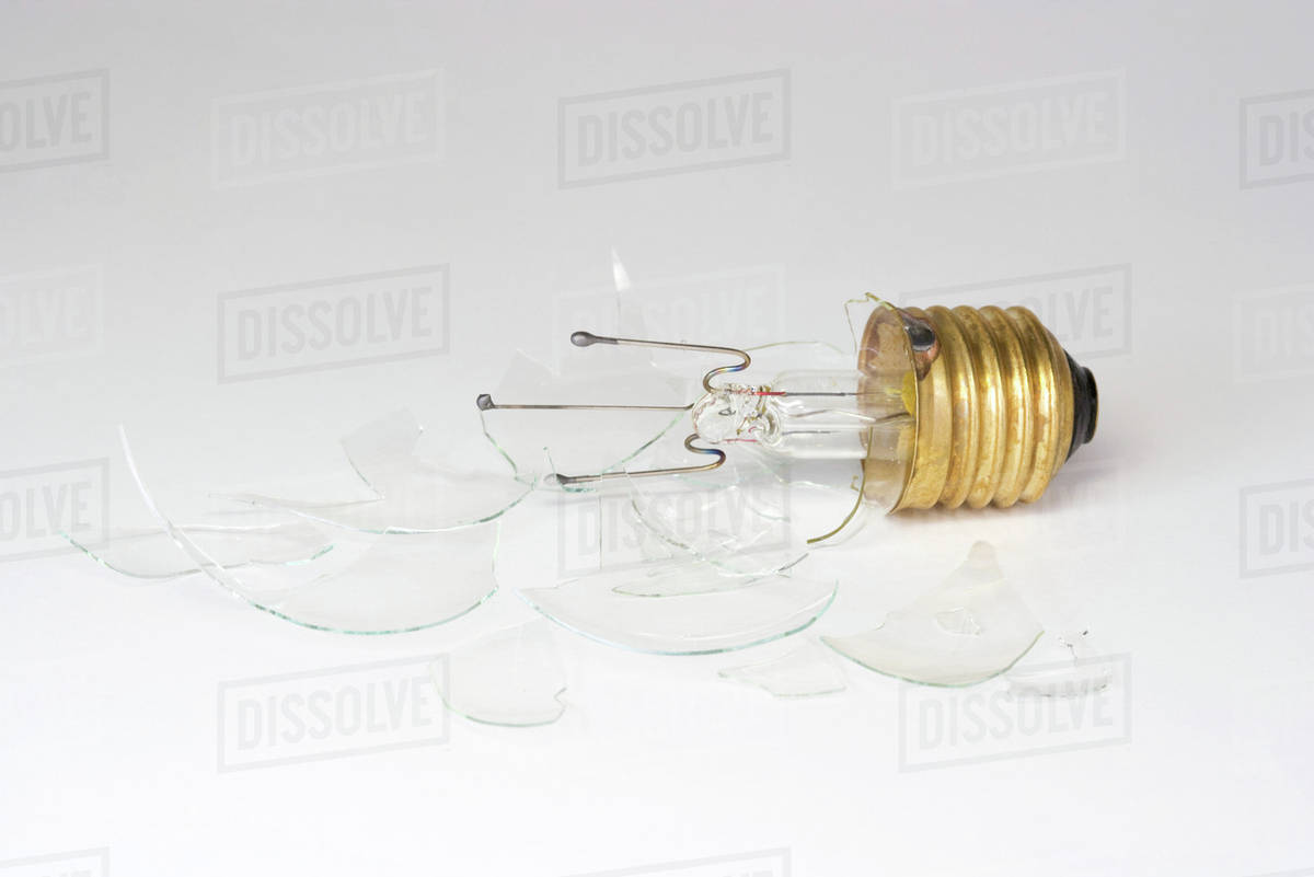 Broken light bulb, close-up - Royalty-free Stock Photo | Dissolve