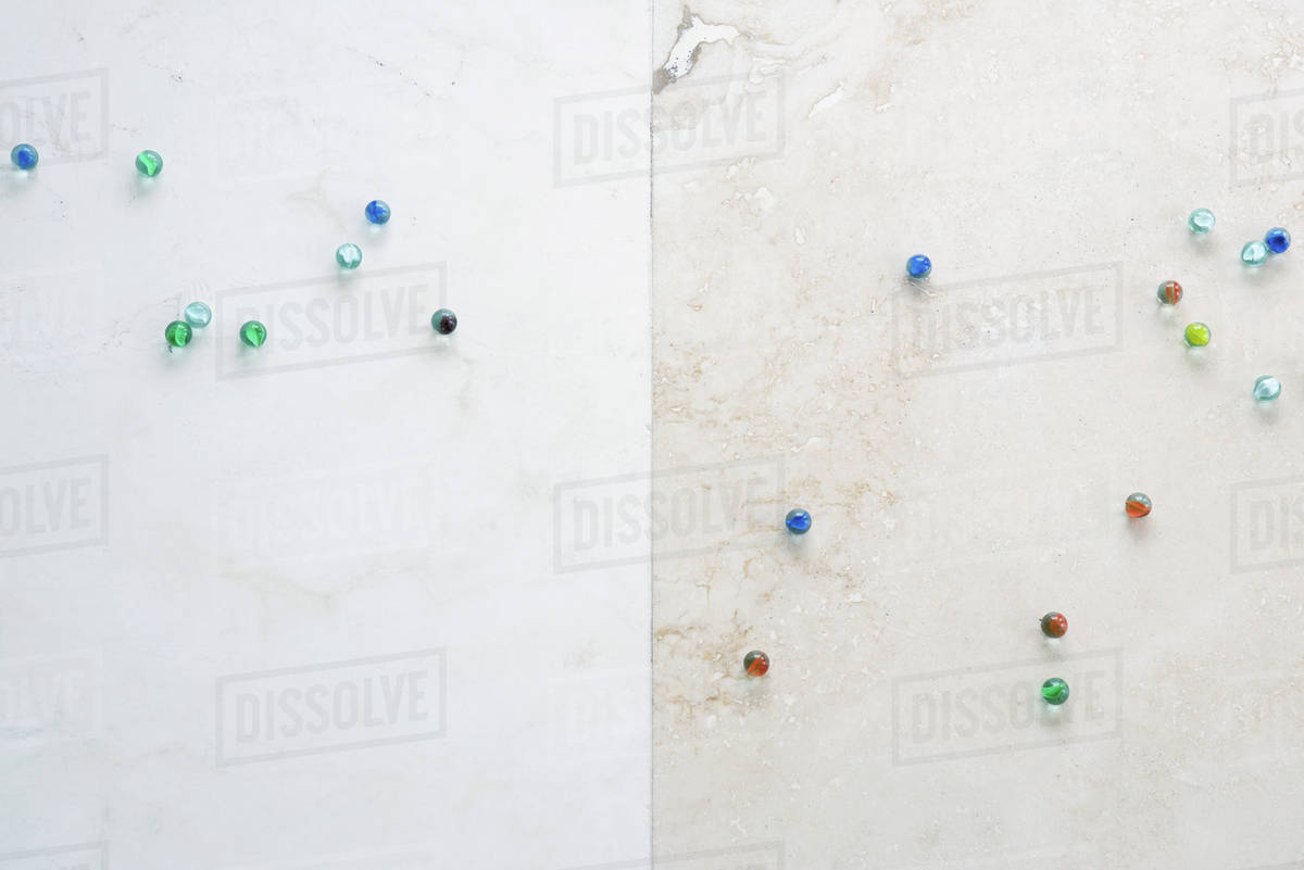 Scattered marbles, high angle view - Royalty-free Stock Photo | Dissolve