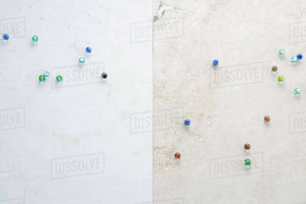 Scattered marbles, high angle view - Royalty-free Stock Photo | Dissolve
