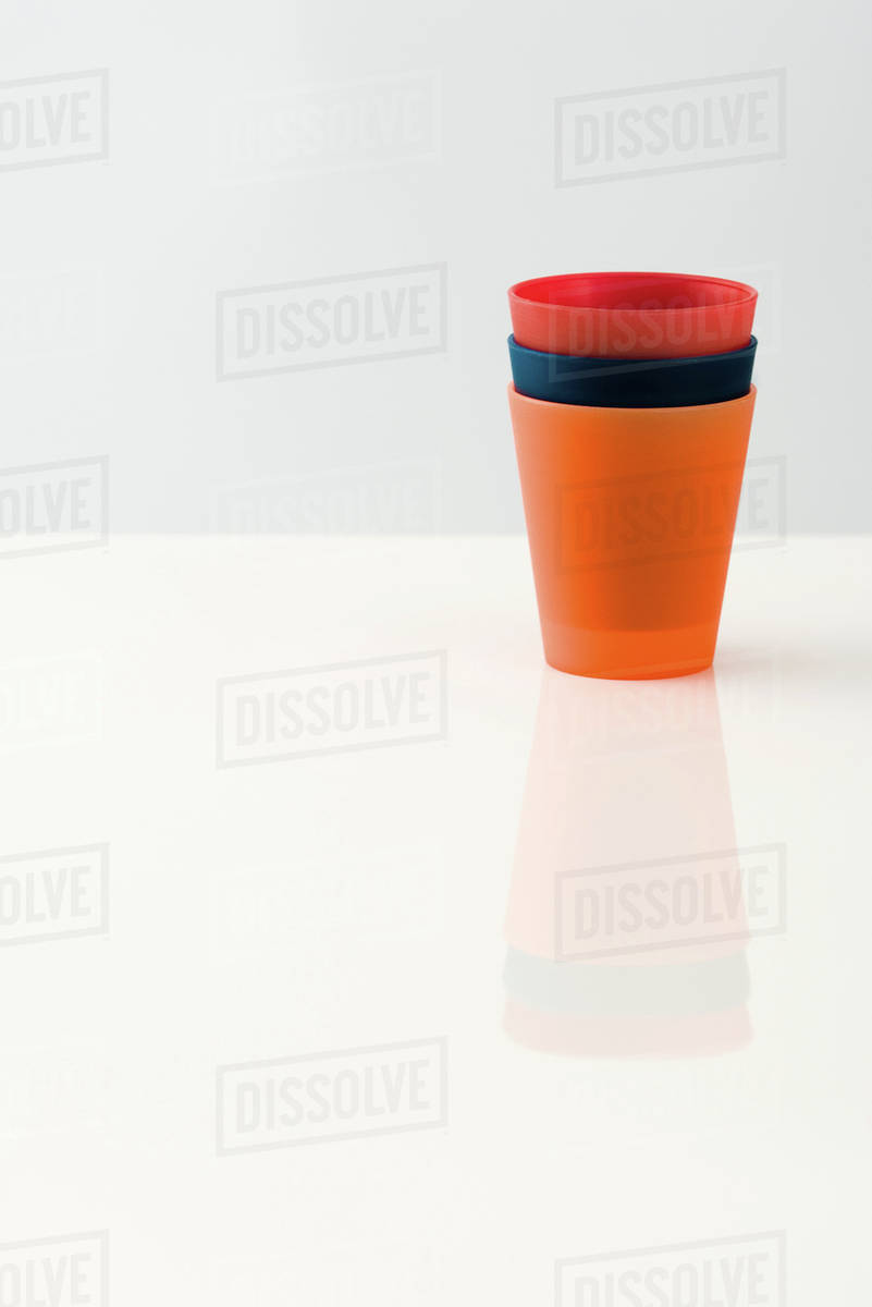 Three plastic cups, stacked - Stock Photo - Dissolve