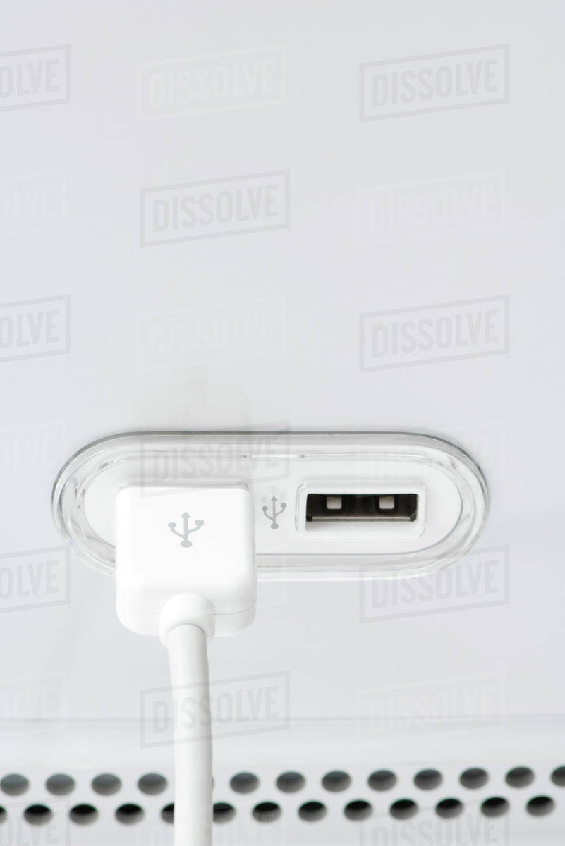USB cable connected to computer port, close-up - Royalty-free Stock ...