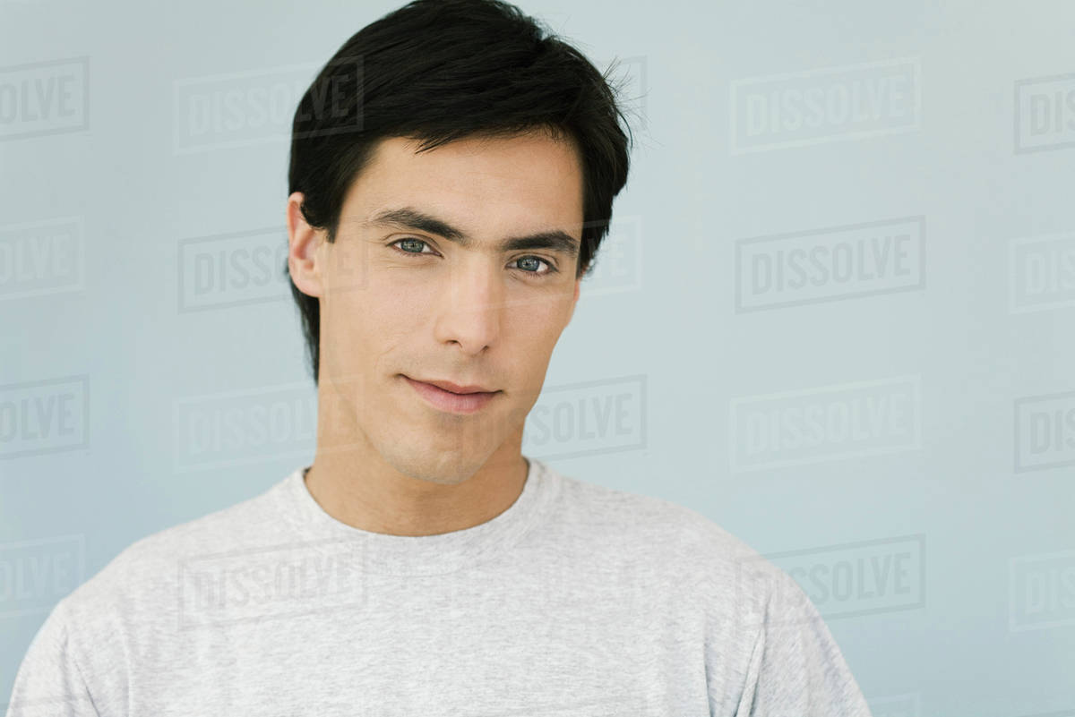 Man smiling at camera, portrait - Stock Photo - Dissolve