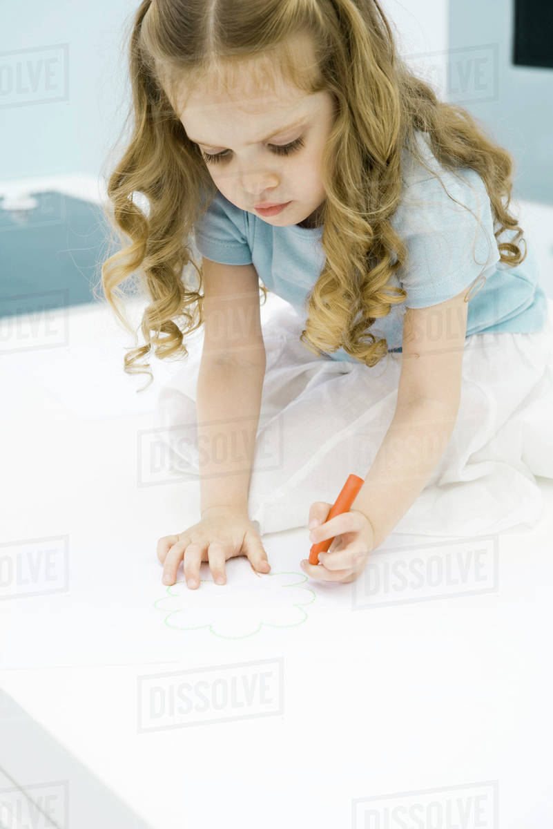 Little girl drawing with crayon, looking down - Royalty-free Stock ...