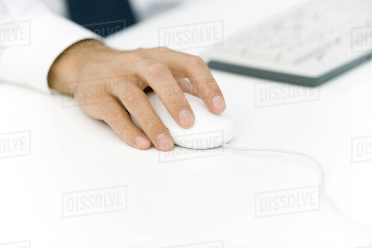 Man using computer mouse, cropped view of hand - Royalty-free Stock ...