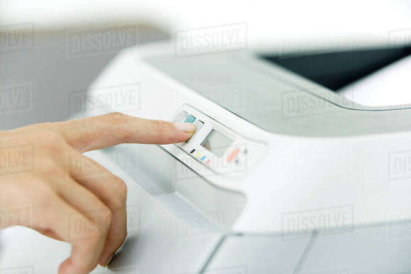 Hand pushing button on printer, close-up - Royalty-free Stock Photo ...