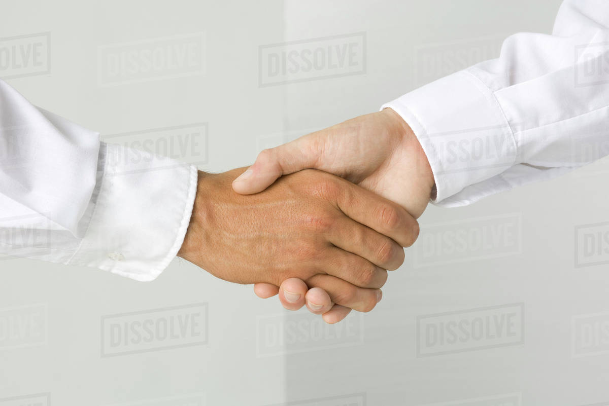 Cropped view of a handshake - Royalty-free Stock Photo | Dissolve