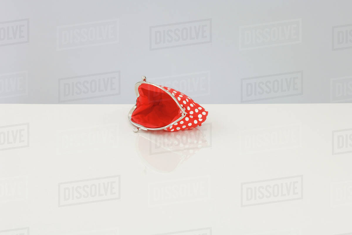 Open and empty coin purse - Royalty-free Stock Photo | Dissolve