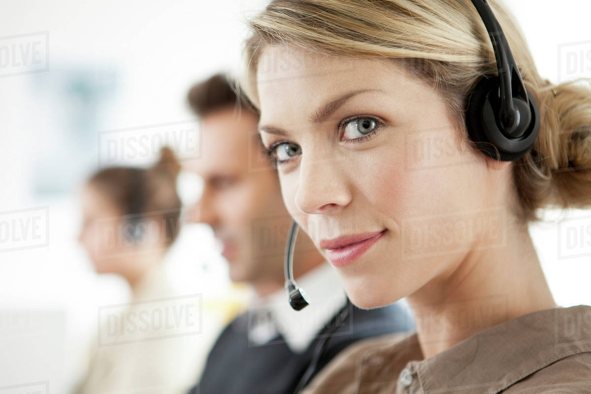 Telemarketer working in call center - Royalty-free Stock Photo | Dissolve