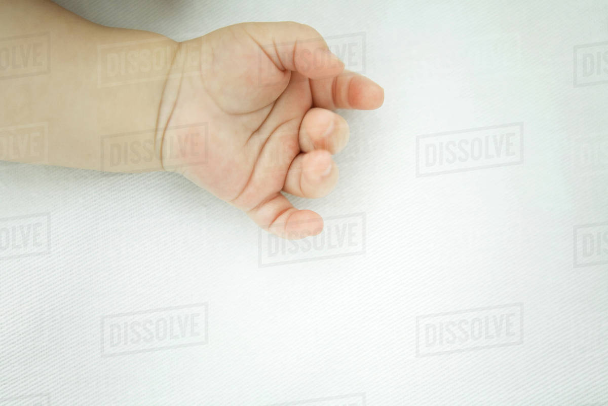 Baby's hand, close-up - Royalty-free Stock Photo | Dissolve