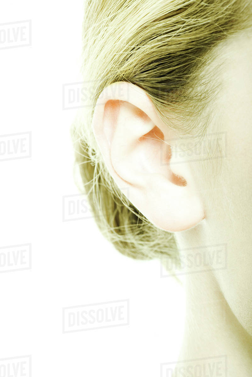 Teenage girl's ear, extreme close-up - Royalty-free Stock Photo | Dissolve