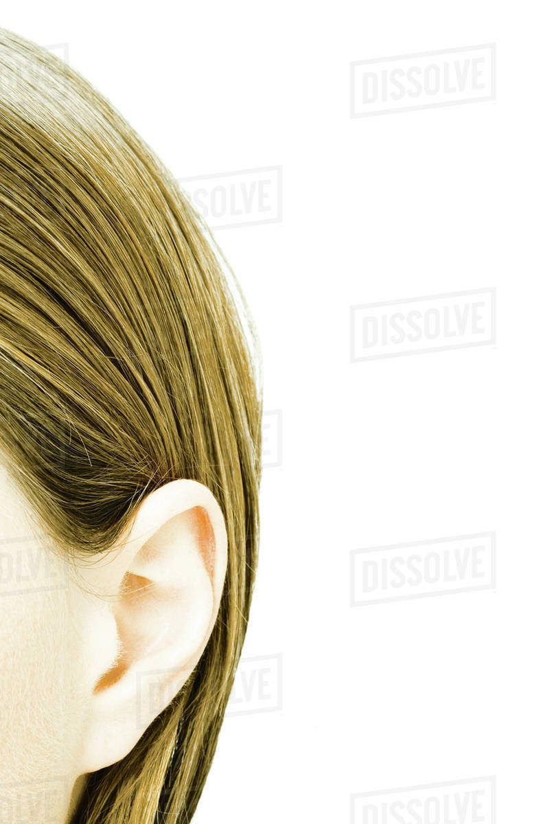Teenage girl's ear, extreme close-up - Royalty-free Stock Photo | Dissolve