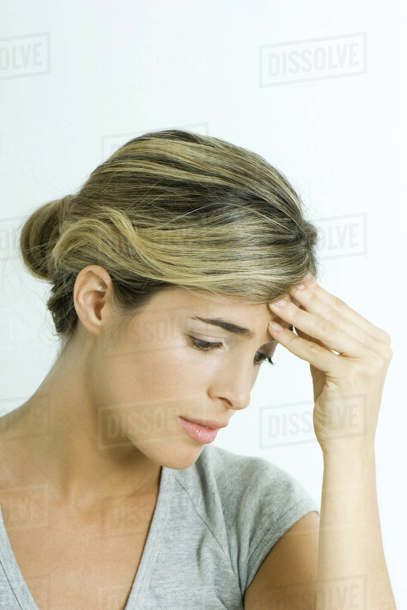 Woman, holding head, portrait - Royalty-free Stock Photo | Dissolve