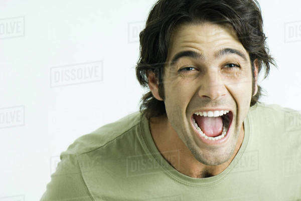 Man, mouth wide open and eyebrows raised, portrait - Royalty-free Stock ...