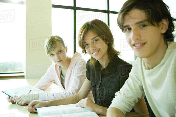 Students studying together, looking at camera, portrait - Stock Photo ...
