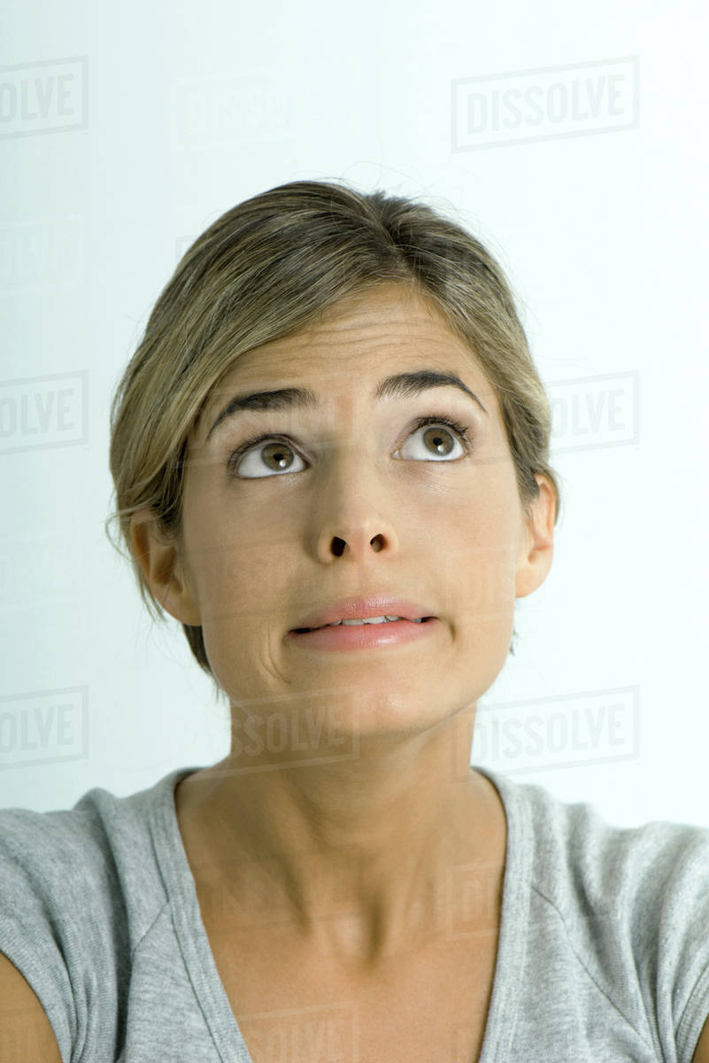 Woman making face, portrait - Stock Photo - Dissolve