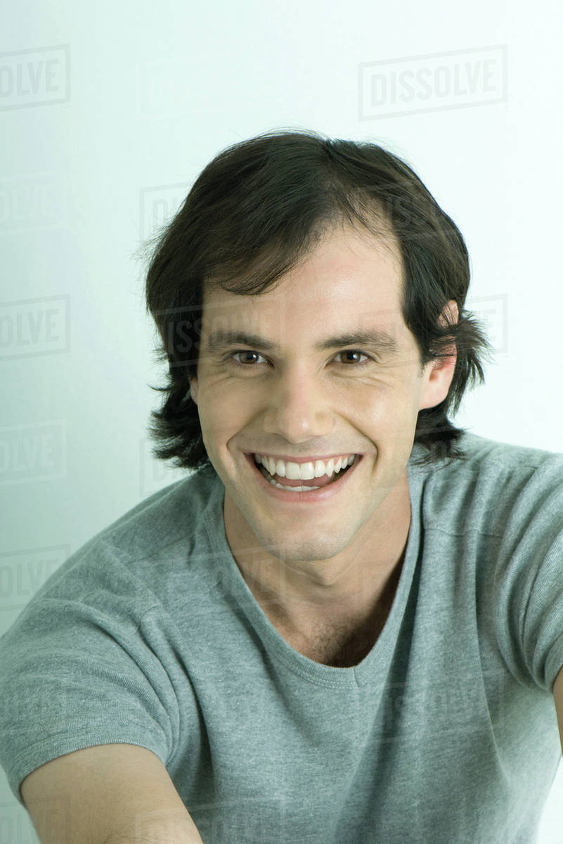 Man with wide smile, portrait - Royalty-free Stock Photo | Dissolve