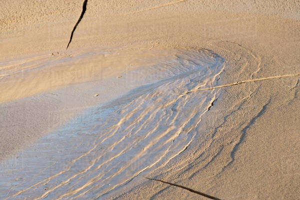 Drying puddle in cracking soil, full frame - Royalty-free Stock Photo ...