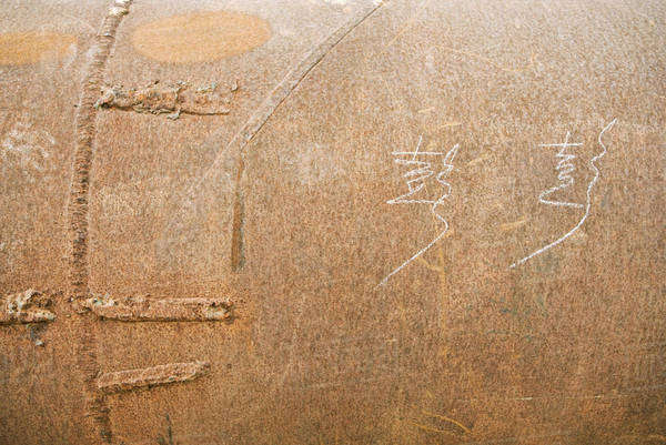 Metal surface with Chinese characters handwritten in chalk - Royalty ...
