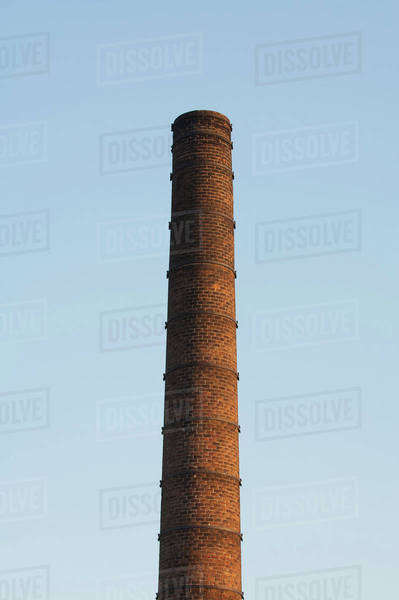 Brick smokestack - Stock Photo - Dissolve